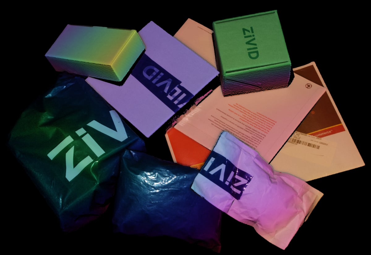 Breaking Through the Speed Barrier in Parcel Induction Robots